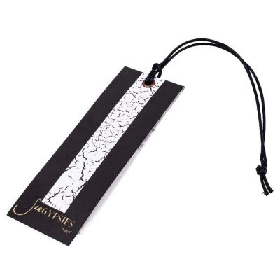 China Shirt Shoes Bags C1S Coated Paper Embossed Swing Tags Eco Friendly for sale