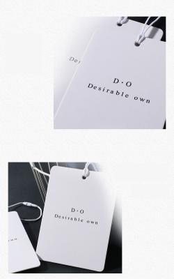 China ODM Rectangle Two Layers Debossing Clothing Label Tag With String for sale