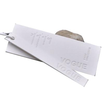 China Embossed Brand Eco PVC Washable Custom Hang Tags For Clothing for sale