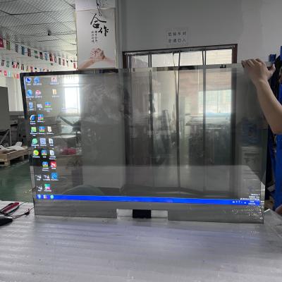 China Salón de exhibición Premium 55 pulgadas OLED pantalla táctil transparente escritorio vertical todo en una máquina en venta