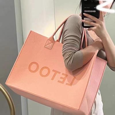China Cosmetic Bag Multi-Pocket Handbag Cartoon Felt Bag With Logo Fashionable Splicing Colors Accept Custom Logo Gift Tote Bag Felt Clothes Shopping Korean Fashion Bags for sale