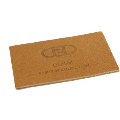 Cina Marrone riveste di pelle le toppe per il ODM di dimensione di logo 8cm×5cm di tensione dei vestiti in vendita