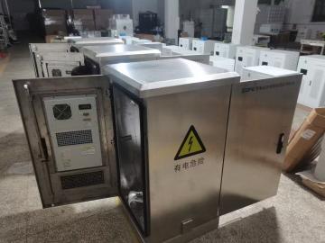 Close-up of telecom cabinet cooling system and ventilation