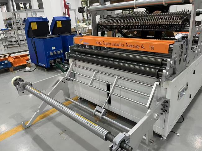 Close-up view of pleating mechanism