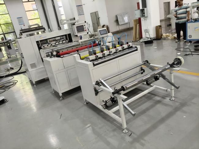 Semi-automatic folding machine side view