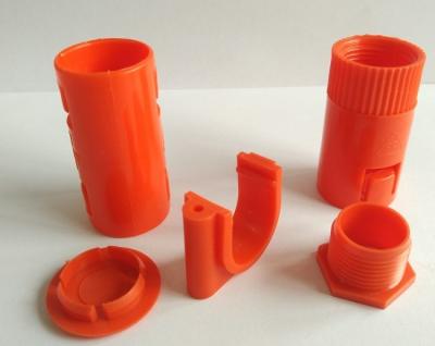China Oranje ABS Plastic Injectie Gevormde Delen Multiholte voor Automaat Te koop