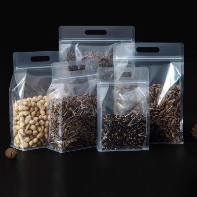 China Custom Plastic Bag Transparent Standup Pouch Resealable Flat Square Bottom Zipper Bag with Handle Nuts Spice Dry Fruit Bag for sale