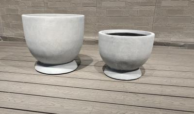 China Light Grey Round Bowl Shape With Pedestal Base Fiber Clay Planter Architectural Landscaping for sale