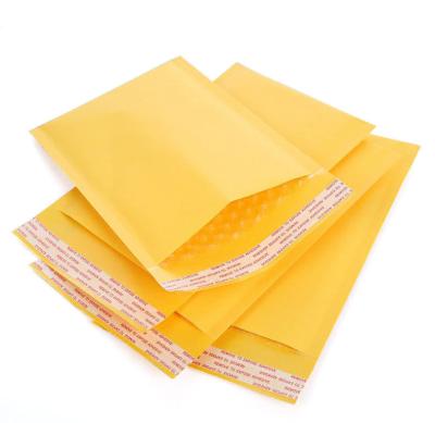 China SZCX Natural Padded Roll Kraft Bubble Mailer Light Purple Bubble Envelope for sale