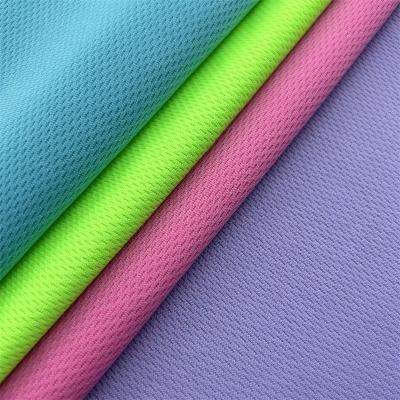 Chine Polyester œil d'oiseau Pique Tissu tricoté élastique Pour chemise Polo à vendre