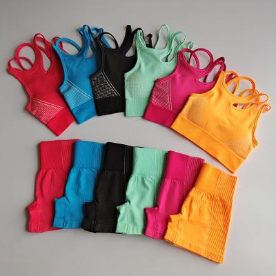 中国 通気性の継ぎ目が無い伸縮自在のヨガの不足分およびスポーツのブラ2pcs 販売のため