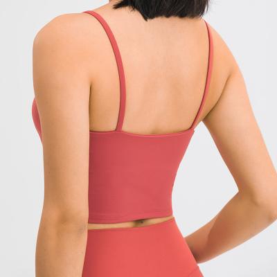 中国 ナイロン スパンデックスのギャザーは女性体育館のタンク トップにパッドを入れた 販売のため