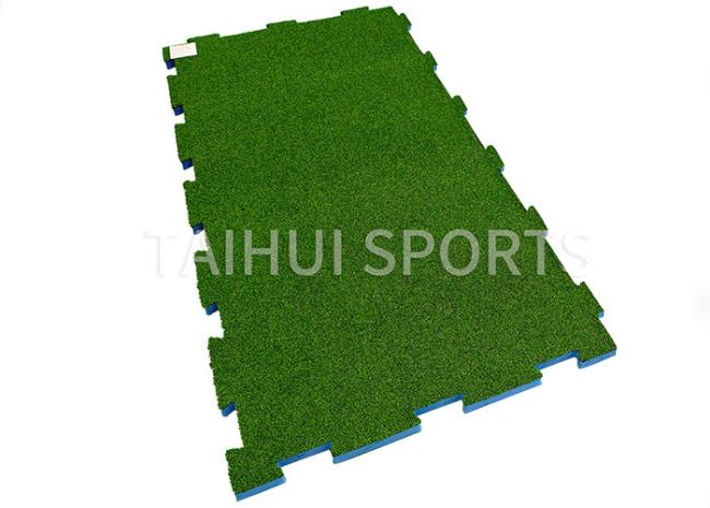 Installed playground shock pad with artificial grass surface