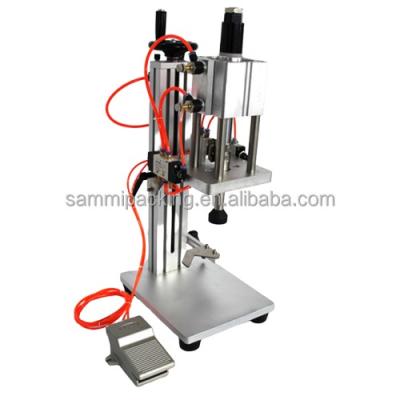 Cina Macchina di chiusura del cappuccio del colletto per profumi di alta qualità Macchina di pressatura del cappuccio in alluminio SM-180 in vendita