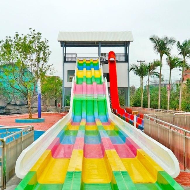 Close-up view of the fiberglass water slide surface