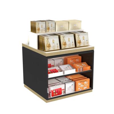 China Cosmetic Display Rack Multifunctional Mask Set Display Island Cabinet for Skincare Store Decoration for sale