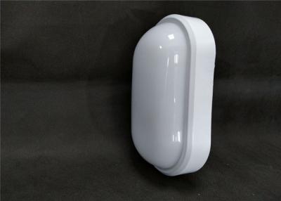 中国 1000lm 12W IP65の白い楕円形の隔壁ランプ/LEDの屋外の隔壁はつきます 販売のため