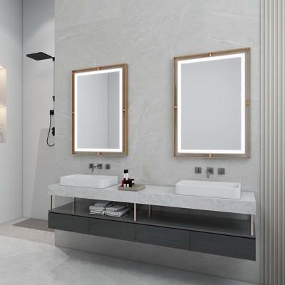 China Instalação de iluminação de espelho de banheiro LED personalizada com modos de cor ajustáveis Habitação à prova d'água e vidro anti nevoeiro para renovações e projetos hoteleiros à venda