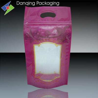 China levántese la bolsa con la cremallera, el empaquetado de la galleta, el bolso de la cremallera con la ventana clara y corte la manija con tintas en venta