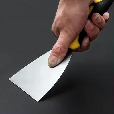 China Alta calidad Nuevo estilo de limpieza de pisos Herramientas de construcción de acero carbono Escarabajo de masilla Cuchillo para pared en venta