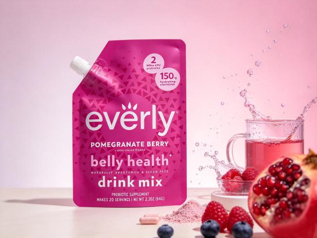 custom magenta spout pouch with fresh fruit, probiotic drink mix health‑food packaging display