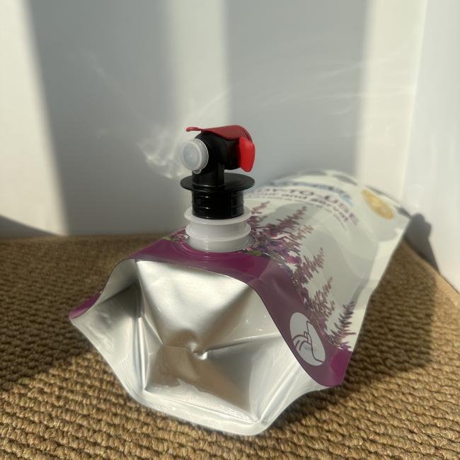 Close up of spout valve structure for 1.5L hummingbird nectar flexible stand‑up pouch, aluminum barrier inner layer