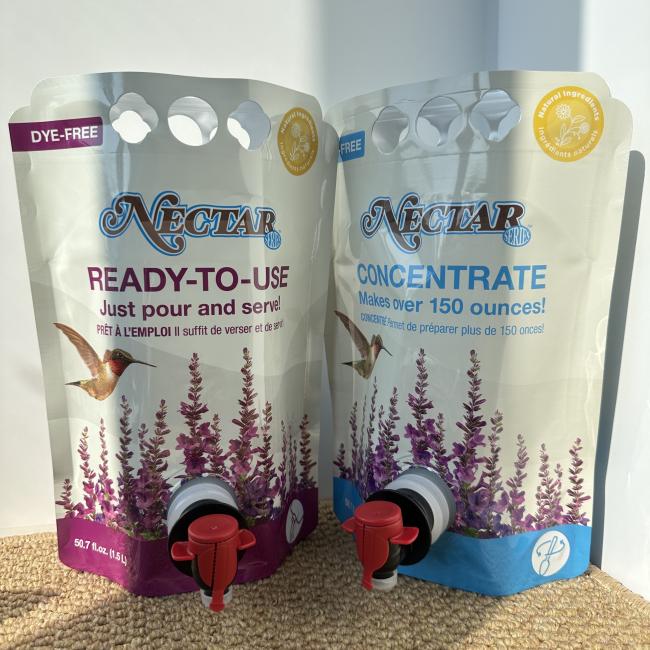 1.5L liquid stand up bag with tap handle holes for bird nectar