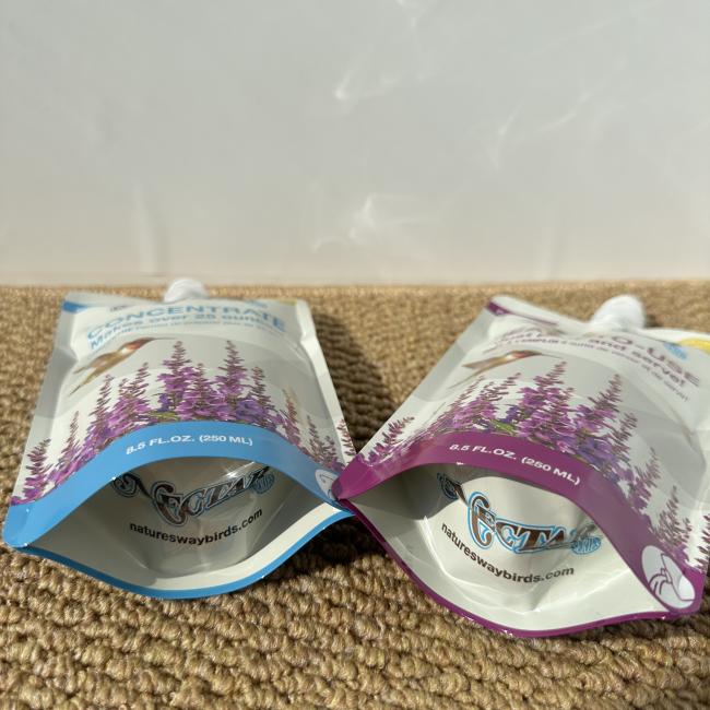 Stand‑up bottom comparison for custom hummingbird nectar concentrate and ready‑use spout pouches, flexible liquid packaging