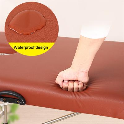 Chine Table de massage de salon de beauté Spa Lit pliable portable avec conception simple multifonctionnelle et sac de rangement inclus à vendre