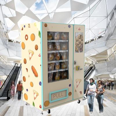 China Cosmetics 24 Hours Self Service Bread Dessert Vending Machines Cupcake Vending Machine with Refrigerated Function and Elevator for sale