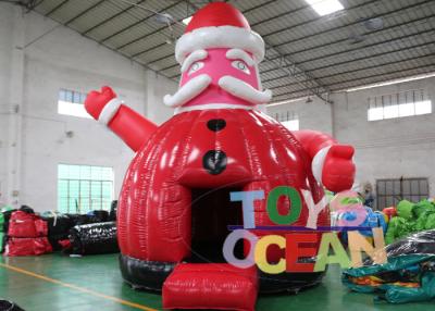 中国 運動場の膨脹可能な跳ね上がりの家のクリスマスのサンタクロースの警備員の形4.5x4.5m 販売のため