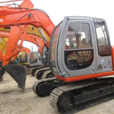 Cina Giappone usato Hitachi EX60-5 escavatore con 2800 ore di lavoro e pompa idraulica originale in vendita