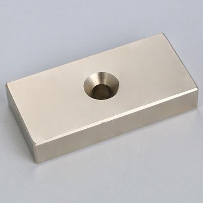 China NdFeB rare earth magnet magnet with hole special-shaped counterbore shape square Ni coating strong magnet for sale