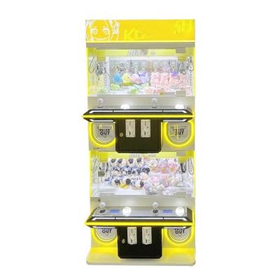 Cina Amusement Game Center Indoor Coin Operated Toy Arcade Doll Claw Machine per 4 giocatori in vendita