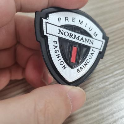 China Custom Design Round Free Design Garment Labels and TPU Badges for Multi-Usage Clothing and Accessories for sale