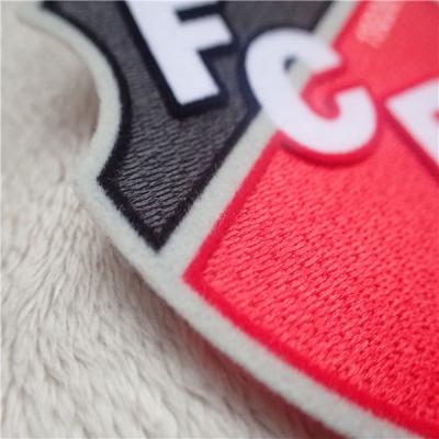 Chine L'habillement fait sur commande durable et lavable raccorde la peluche irrégulière de bouclier s'assemblant chromatiquement à vendre