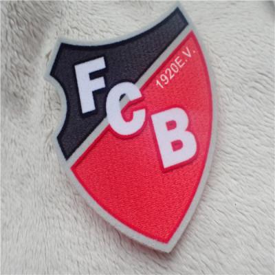 Chine L'habillement fait sur commande durable et lavable raccorde la peluche irrégulière de bouclier s'assemblant chromatiquement à vendre