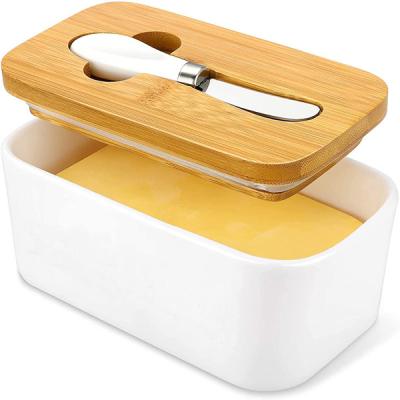 Cina Piatto di burro ceramico bianco con il coperchio ed il coltello per i rifornimenti in serie della cucina del contatore di cucina in vendita