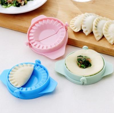 中国 魔法の創造的な手動パック機械Food-gradeプラスチック台所用具はゆで団子を形成するつまむ 販売のため