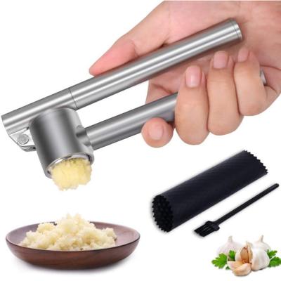 Cina Insieme della sminuzzatrice & di Peeler dell'aglio di acciaio inossidabile della prova 304 della ruggine del tritatore della stampa di aglio in vendita