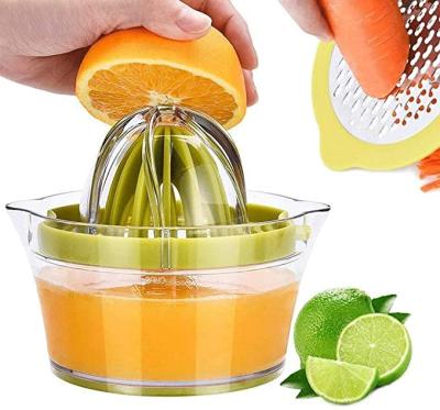 China A cozinha maioria manual fornece o Juicer alaranjado do espremedor de frutas do limão com o ralador do copo de medição à venda