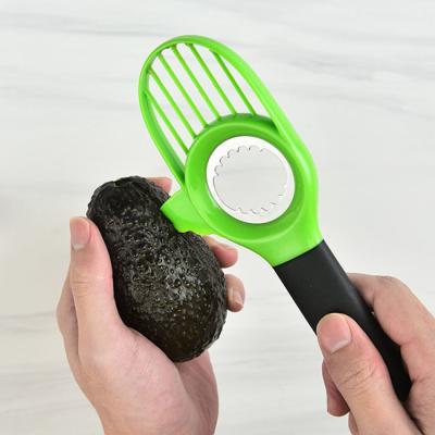 中国 1つのプラスチック アボカドのカッターのナイフのCorerのアボカドのスライサーのアボカド用具の台所3 販売のため