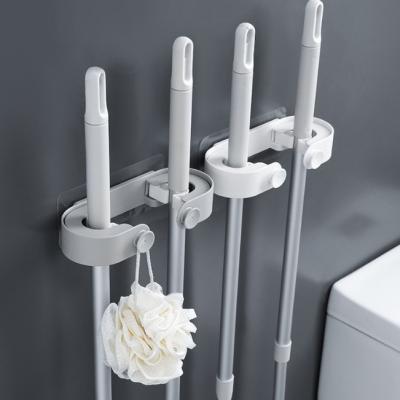 Cina Zazzera dell'ABS e supporto di plastica della parete del supporto della scopa per la cucina domestica del bagno in vendita