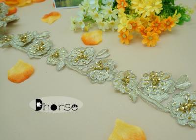 Cina Il fiore dell'oro 3D cuce sulla disposizione in rilievo dall'iarda per il vestito dalle donne in vendita