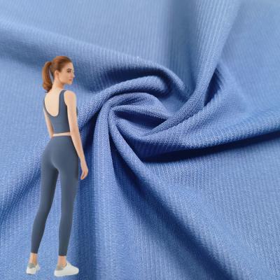 China Customized Nylon Spandex Stretch Tricot Fabric Breathable Soft Dyed Solid Swim Suit Fabrics Plain Women's Sportswear Activewear for sale