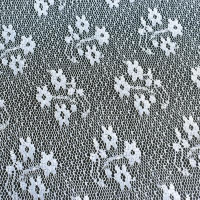 China Women's & Children's Clothing Soft Little Flowers Lace Fabric Mesh Nylon Non-Elastic Wholesale Tulle Stage Clothing Manufacturer for sale