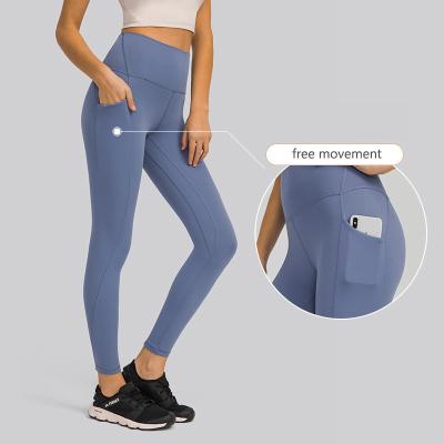 Cina Alto spingere verso l'alto della vita l'attivo delle calzamaglia di sport della tasca di forma fisica di allenamento dei pantaloni dell'yoga delle donne in vendita