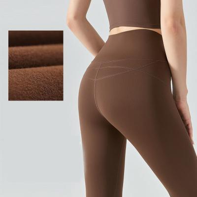 中国 冬のPlushヨガは暖かい適性のズボンのモモの情報通の練習のタイツを厚くした 販売のため