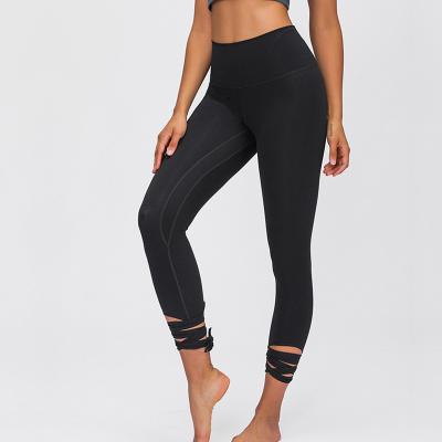 China A ioga do estiramento das mulheres do pé da correia arfa o exercício Stretchable Capris do controle da barriga à venda