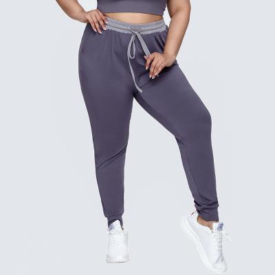 Cina Essiccazione rapida sciolta più i pantaloni di yoga di dimensione che eseguono i pantaloni casuali di sport del cordone in vendita